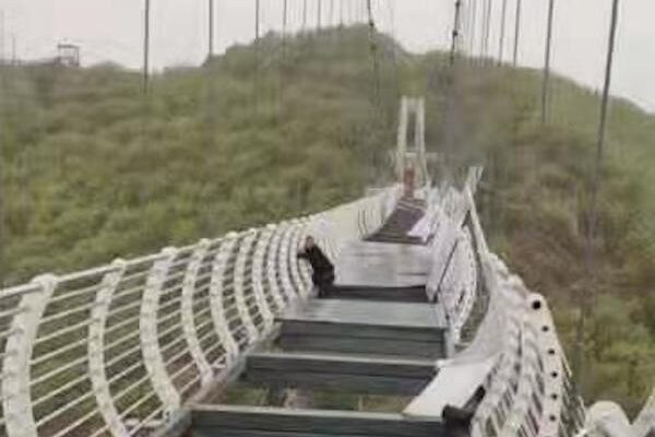 Glass Bottom Bridge In China Collapses, Man Holds On 330 Feet Above The ...